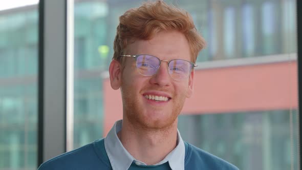 Young Ginger Irish Man in Glasses Crossing Hands on Chest Portrait ...