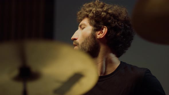 Portrait of Bearded Drummer Performing Solo on Drum Cymbals in ...
