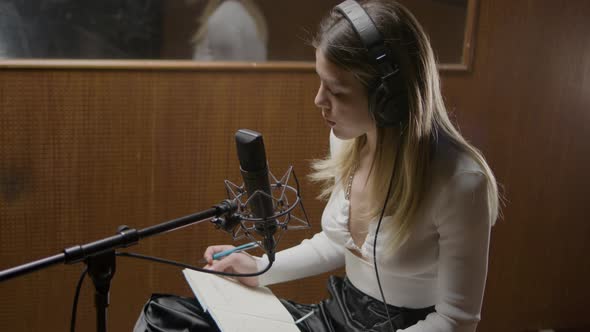 Beautiful Female Singer Working in Music Studio, Stock Footage | VideoHive