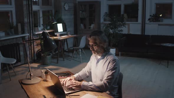 Man Working Alone In Office At Night, Stock Footage | VideoHive
