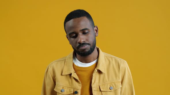 Portrait of Confused and Helpless African American Man Making Hopeless ...