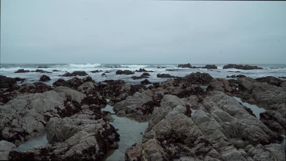 Beautiful overcast rocky beach and waves in Monterey California 4k ...