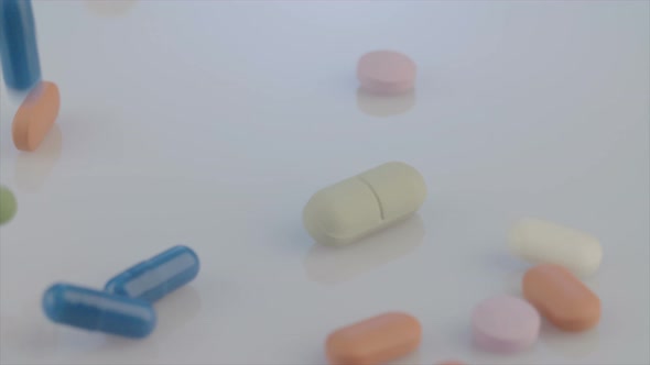 Slow motion of Prescription drugs - Capsules, pills, tablets falling on ...