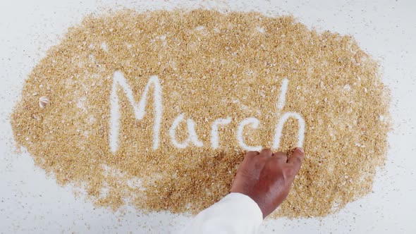 Hand Writes On Sand March , Stock Footage | VideoHive