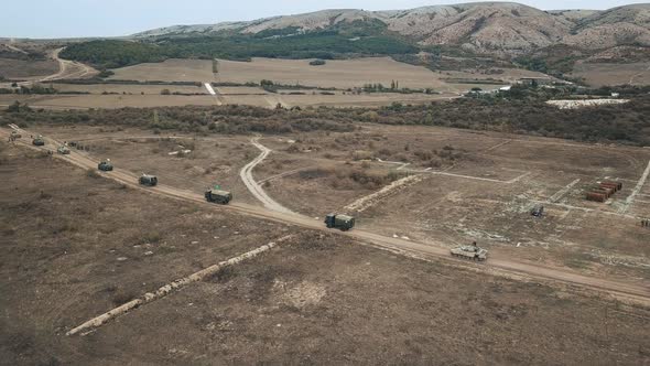 Military Convoy Moves Frame with Aerial, Stock Footage | VideoHive