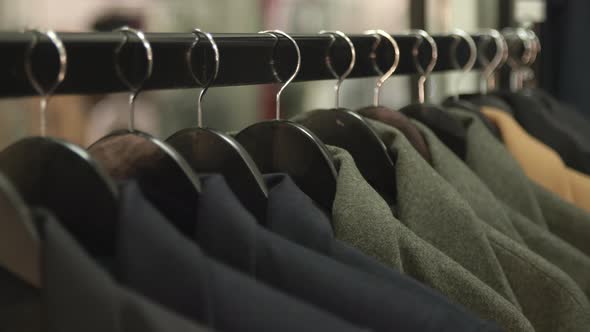 Women's Hand is Taking Cloth From the Hanger Close Up, Stock Footage