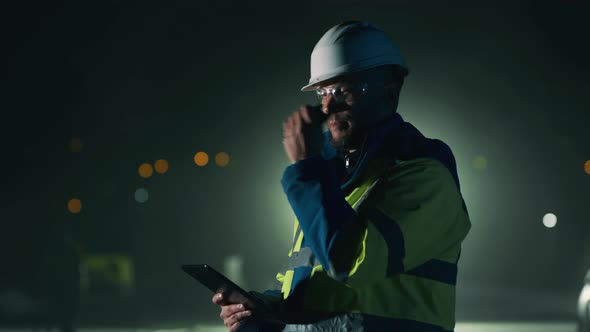 Foreman Calling Employee at Night, Stock Footage | VideoHive