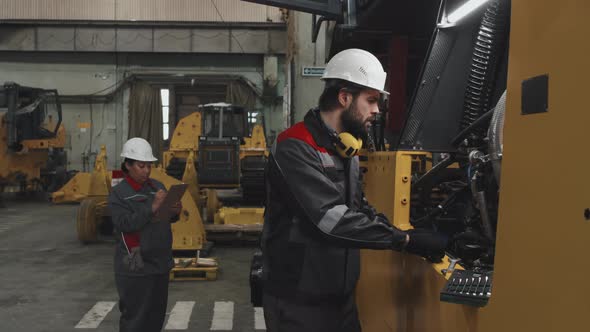 Factory Worker Fixing Machinery, Stock Footage | VideoHive