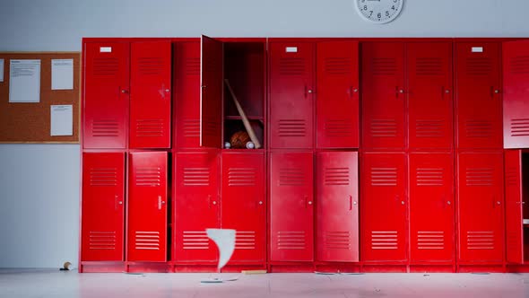 Scary abounded school hallway. Wind blowing and moving red lockers ...