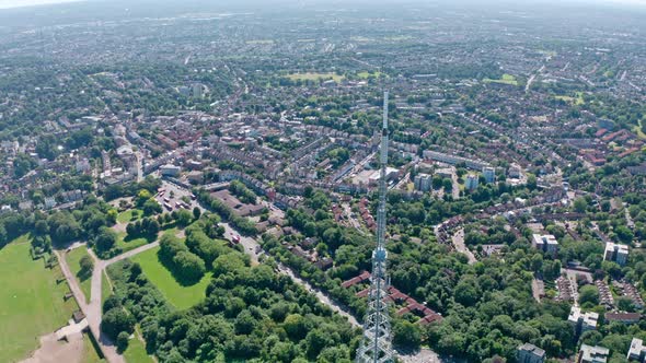 Rising pan down drone shot of Crystal palace radio tower, Stock Footage