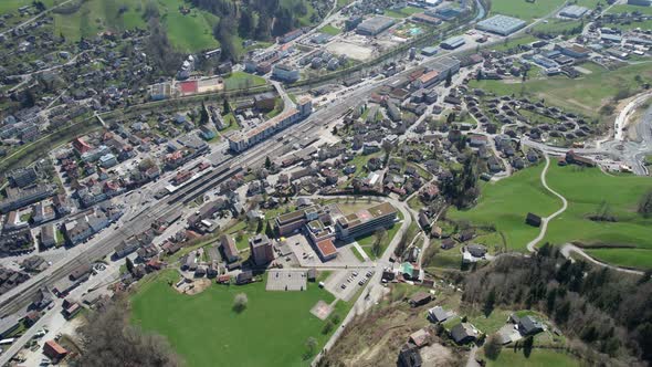 Beautiful aerial flight over the village Wattwil in a swiss rural ...