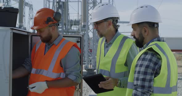 Engineer Showing Power Transformer To Inspectors, Stock Footage | VideoHive