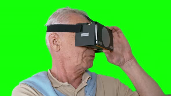 Gesturing Old Man in VR Headset, Stock Footage | VideoHive