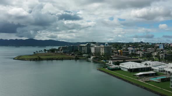 Capital city of Fiji, circle pan aerial of Suva, urban scenery of ...