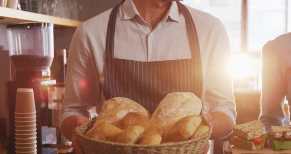 Waiter and waitress holding buns and sandwiches, Stock Footage | VideoHive