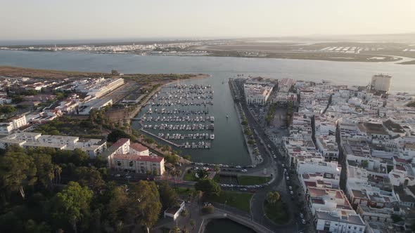 Ayamonte harbor and village, Andalusia in Spain. Aerial backward, Stock ...