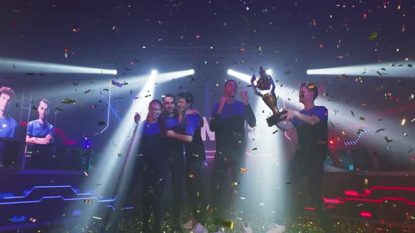 Team of Winners Celebrating Success After Gaming Tournament, Stock Footage