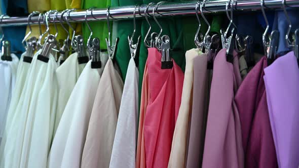 Factory Samples of Multicolored Fabrics Hang on a Hanger, Stock Footage