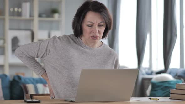 Old Senior Woman with Back Pain Working on Laptop, Stock Footage ...
