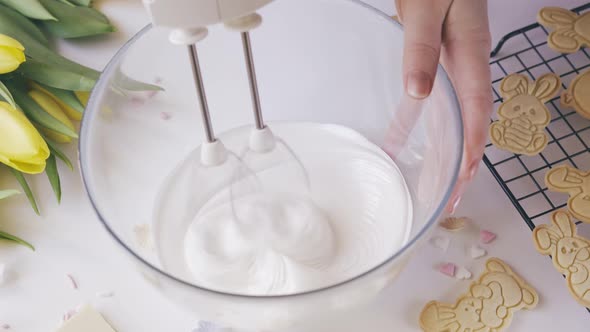Woman Whisk Cookie Icing for Decoration, Stock Footage | VideoHive