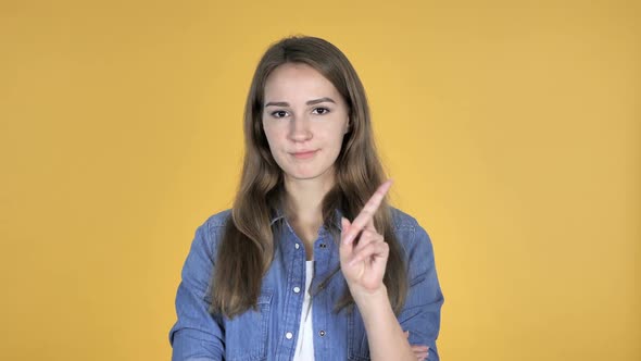 Pretty Woman Waving Finger to Refuse Isolated on Yellow Background ...