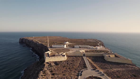 Cinematic aerial elevation shot of historical defensive fort, Sagres ...