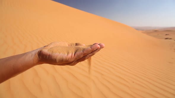 Desert Sand Running Through Fingers of Single Hand, Stock Footage ...