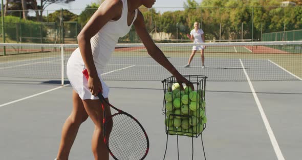 Video of african american female tennis player holding racket and ...