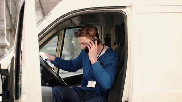 Delivery Driver Checking the Paperwork in His Van, Stock Footage ...