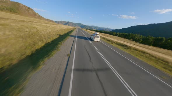 Aerial View White Minibus with Roof Box Driving on Highway at ...