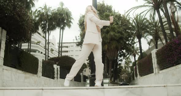 Young Woman Dancing Around Street Light, Stock Footage | VideoHive