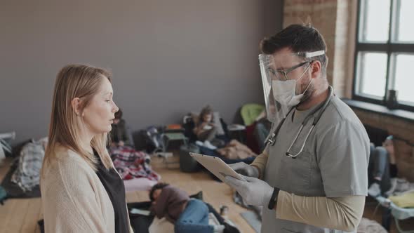 Medical Worker Talking to Woman in Asylum, Stock Footage | VideoHive