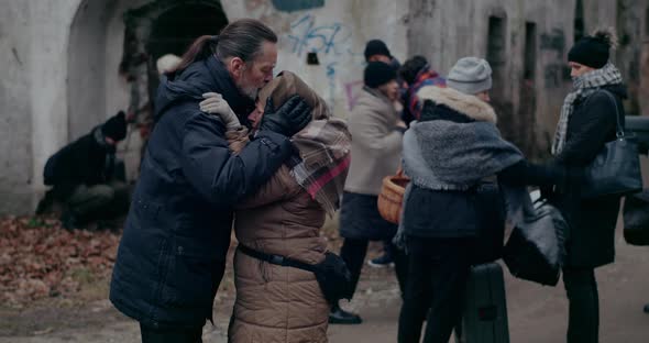 Man Consoling Immigrant Woman Crying During War, Stock Footage | VideoHive