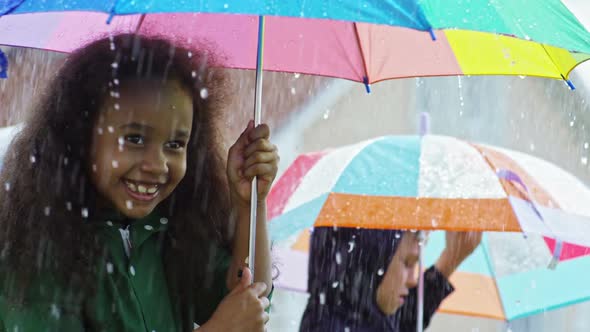 Laughing Little Girl Catching Raindrops, Stock Footage | VideoHive