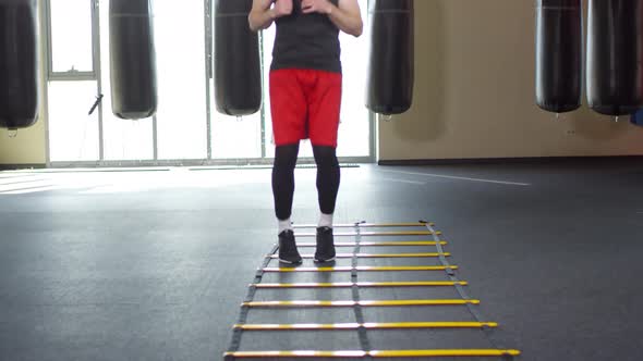 Male Boxer Exercising with Double Agility Ladder, Stock Footage | VideoHive