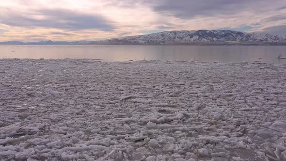 Panning over broken ice on frozen lake in winter, Stock Footage | VideoHive