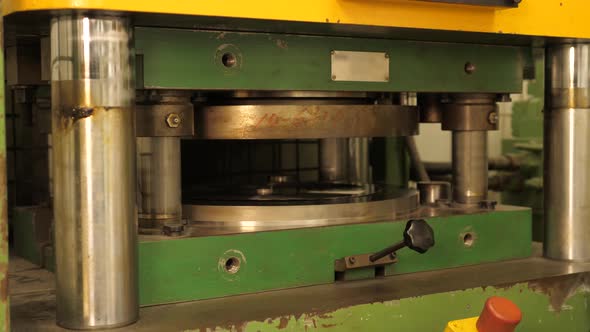 Vinyl record pressing machine in action, Making metal stamper for the ...