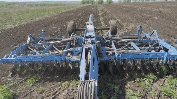 Disking the soil. Short disc harrow., Stock Footage | VideoHive