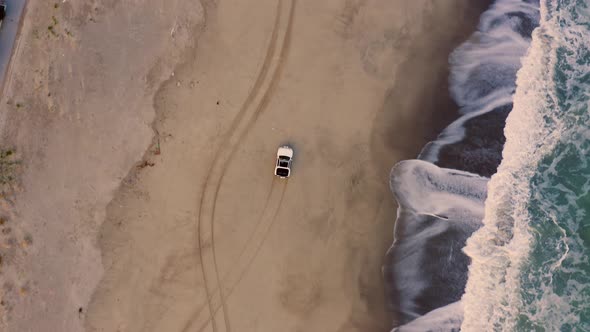 Off road 4wd car on the beach near the ocean, Stock Footage | VideoHive