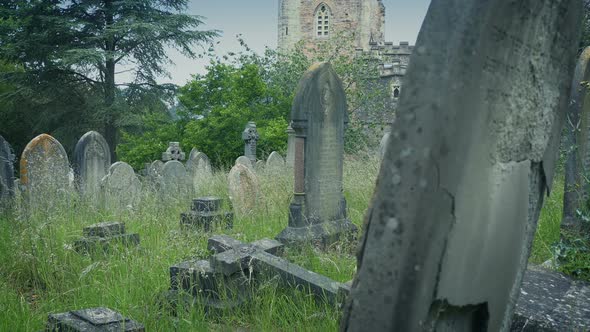 Windy Cemetery With Graves In The Daytime, Stock Footage | VideoHive