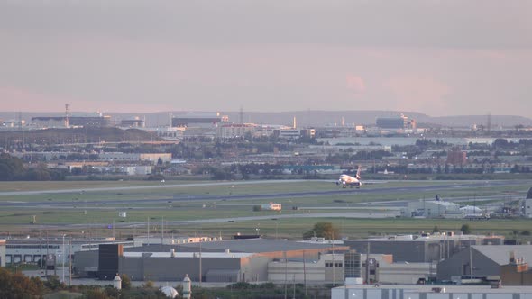 Airplane descent on an international airport landing on the runway ...
