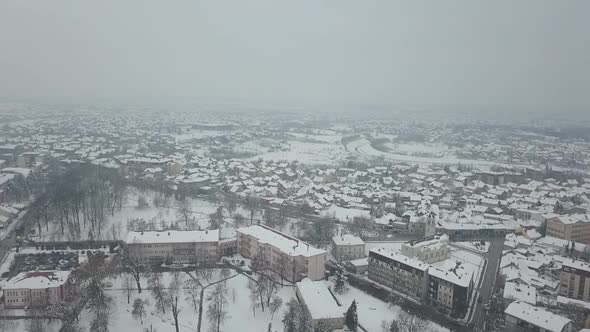 Aerial view of small town covered in snow, Stock Footage | VideoHive