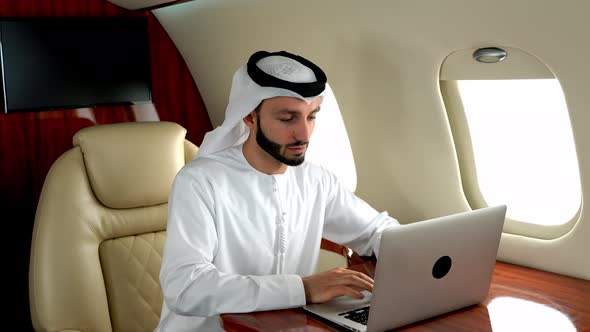 Arabian man flying on his Private jet to dubai., Stock Footage | VideoHive