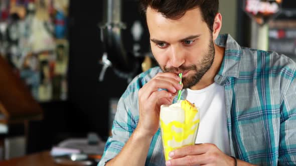 Happy man drinking milkshake, Stock Footage | VideoHive