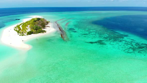Aerial: Flying over idyllic atoll, exotic travel destination in ...