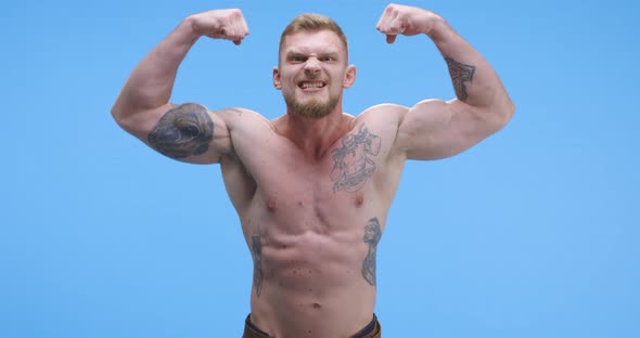 Buff Man Flexing His Arms, Stock Footage | VideoHive