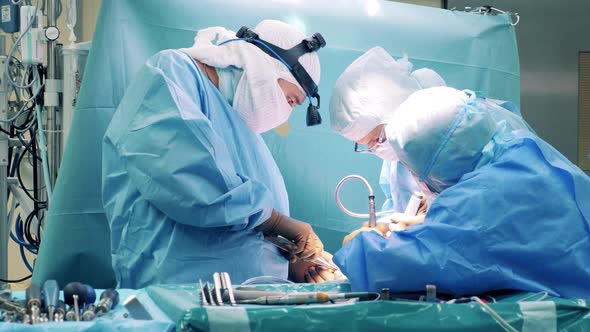 Group of Surgeons are Performing an Operation Behind a Curtain, Stock ...