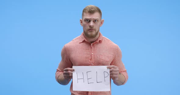 Man Holding Help Sign, Stock Footage | VideoHive