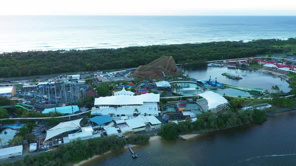 Drones eye view of Seaworld Theme Park at sunrise, new rollercoaster ...