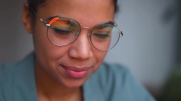 Female Student in Eyeglasses Using Computer Flicker and Reflections on ...